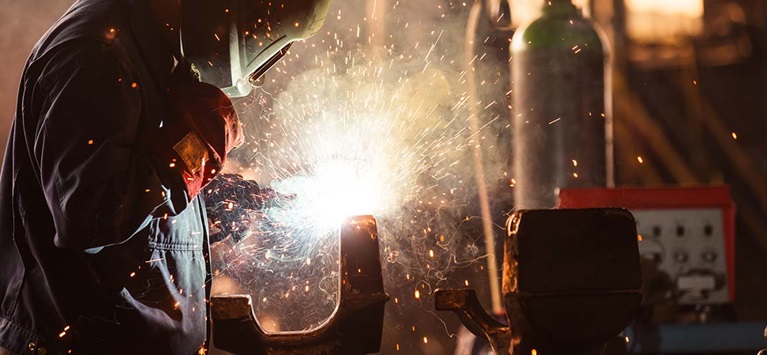 How can organisations manage and mitigate fire risk?